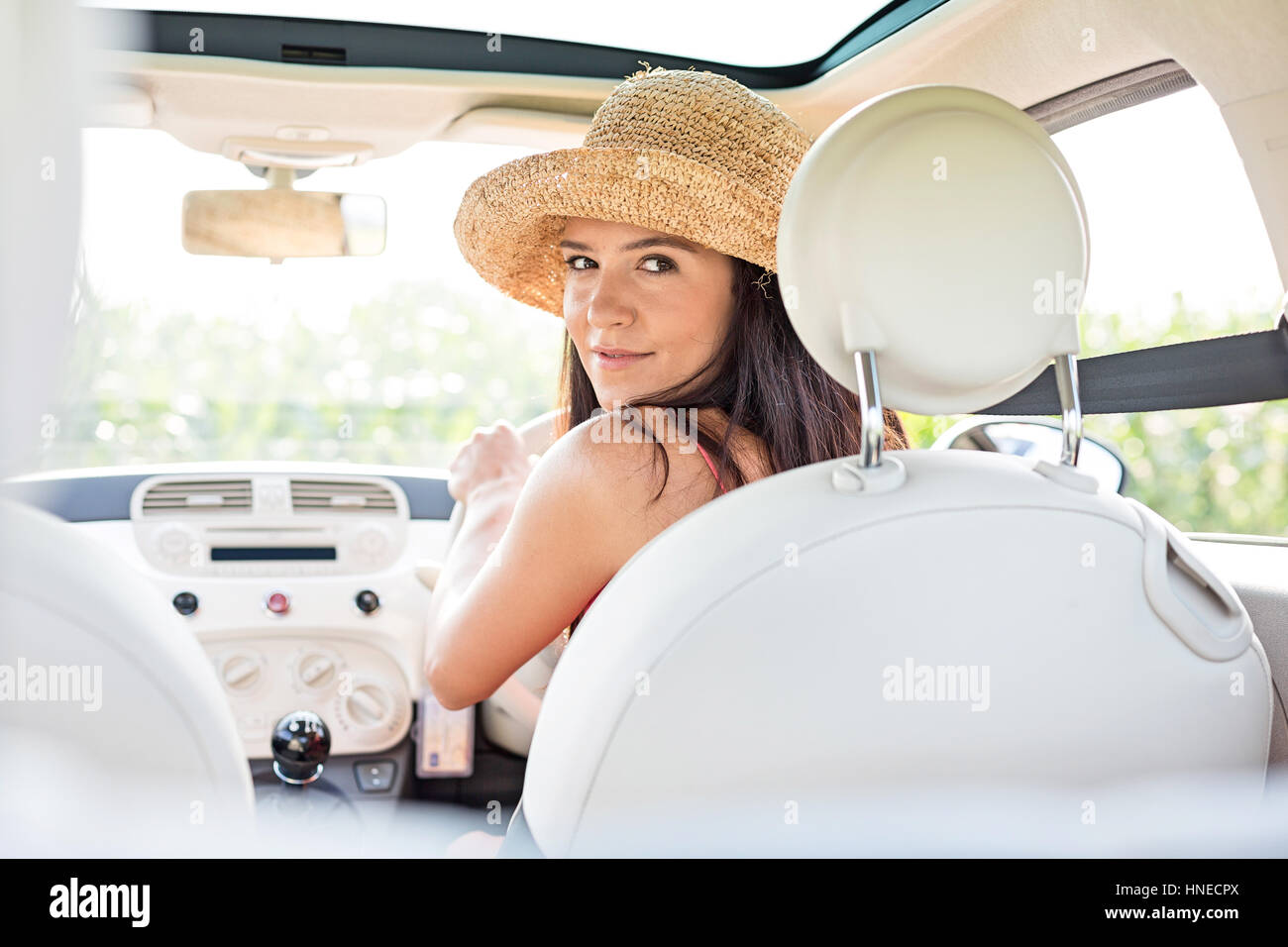 Car driving away sun hi-res stock photography and images - Alamy