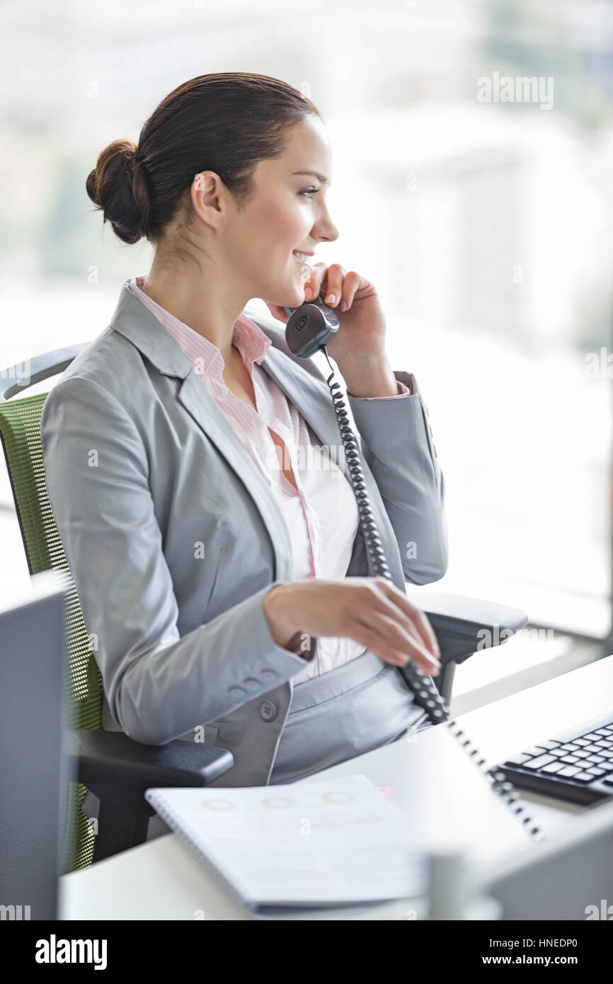 Landline phone conversation hi-res stock photography and images - Alamy