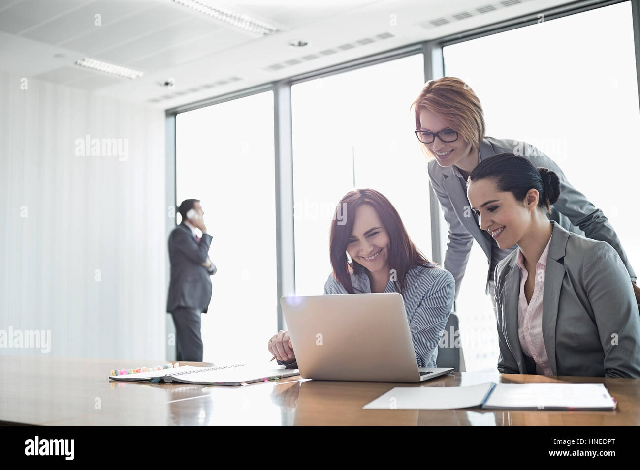 Businesswomen using laptop in office Stock Photo - Alamy Businesswomen using laptop in office Stock Photo - Alamy