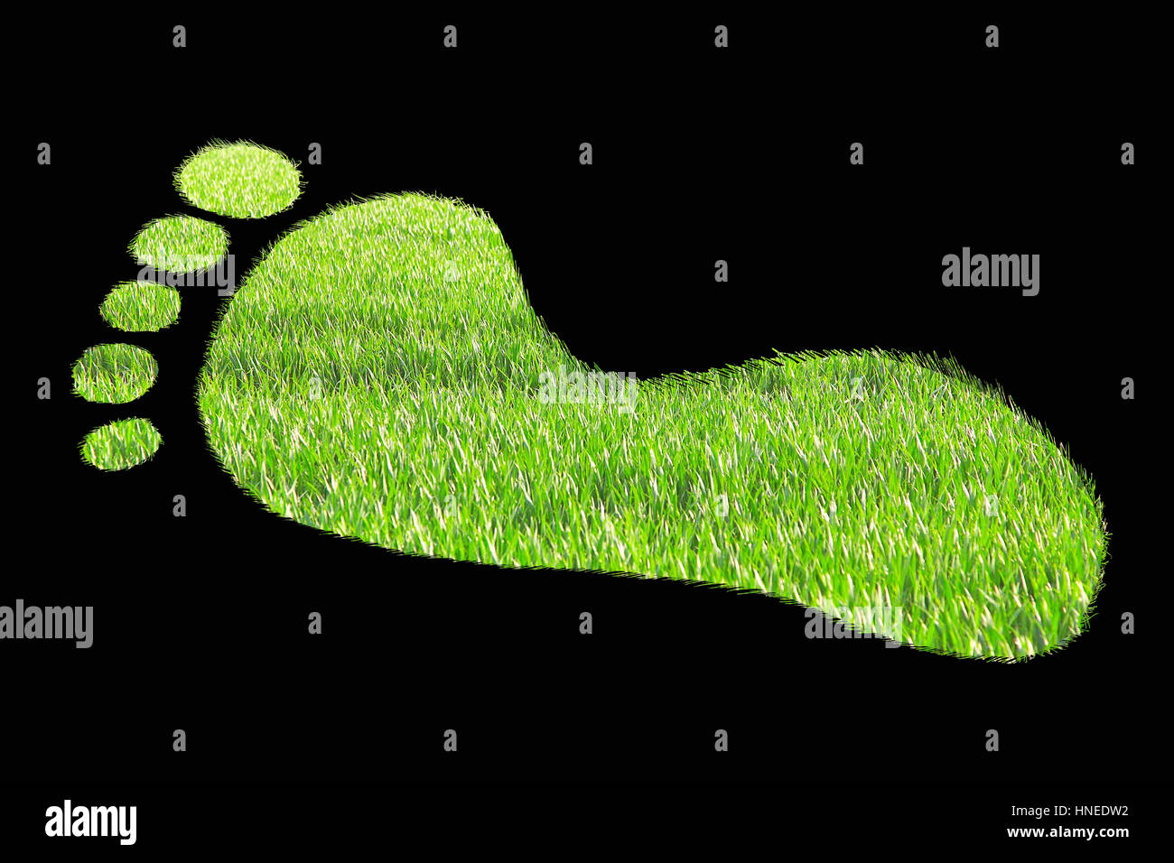 Close-up of green footprint over black background Stock Photo - Alamy