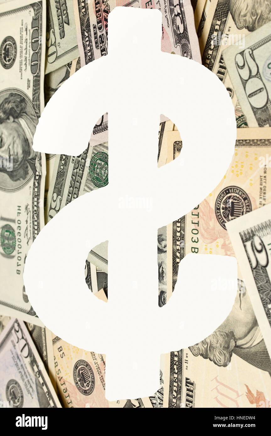 Digital composite image of dollar sign over banknotes Stock Photo - Alamy