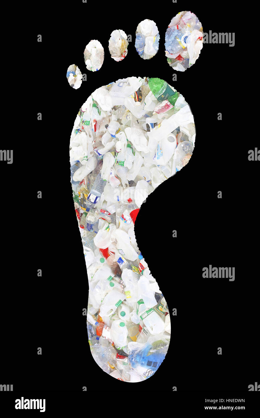 Pile of plastic bottles in footprints over black background Stock Photo ...