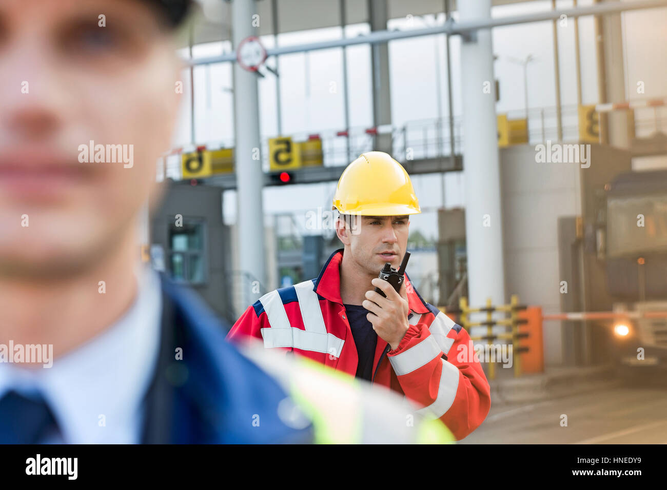 Employee using walkie talkie hi-res stock photography and images - Alamy