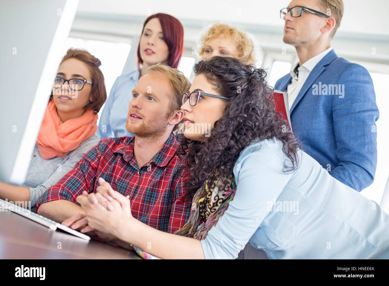 Business people using computer in office Stock Photo - Alamy