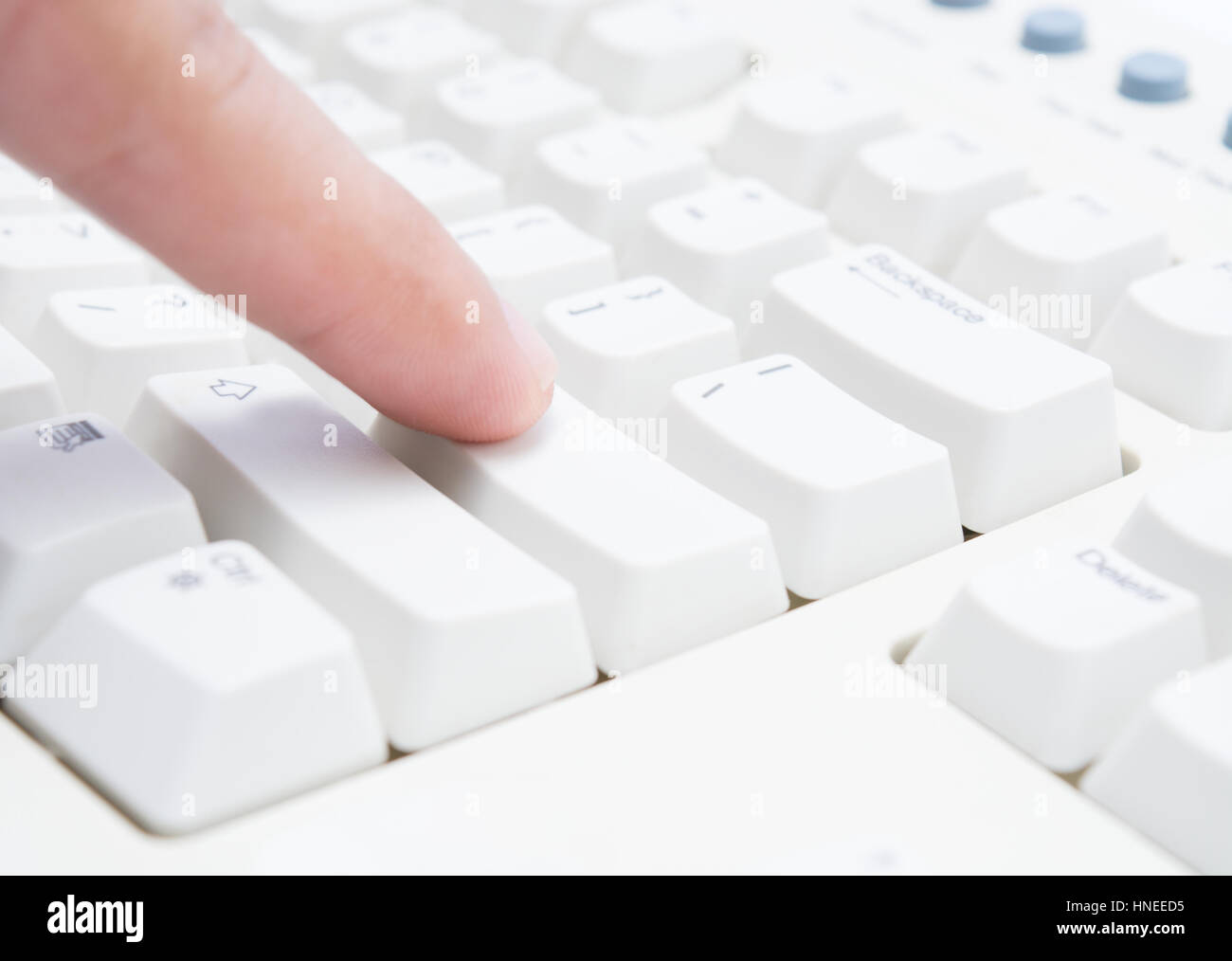 finger is pressing keyboard key that has copy space,empty keyboard key ...