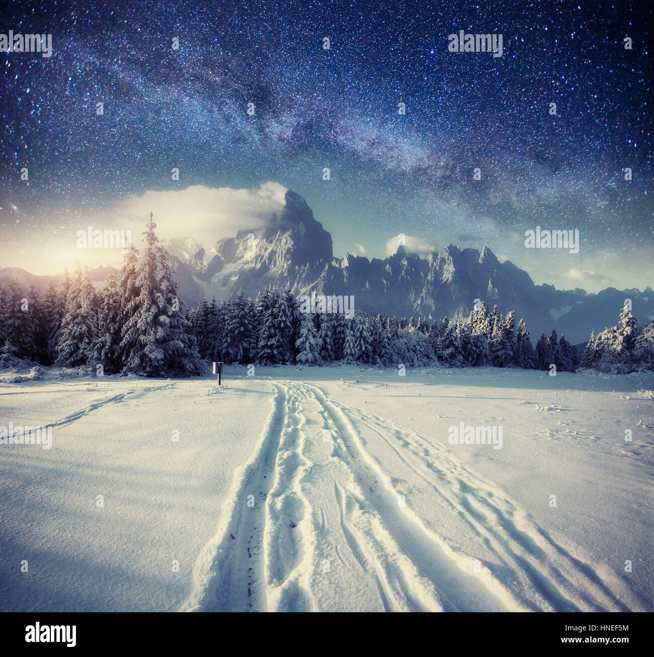 starry sky in winter snowy night. fantastic milky way Stock Photo - Alamy