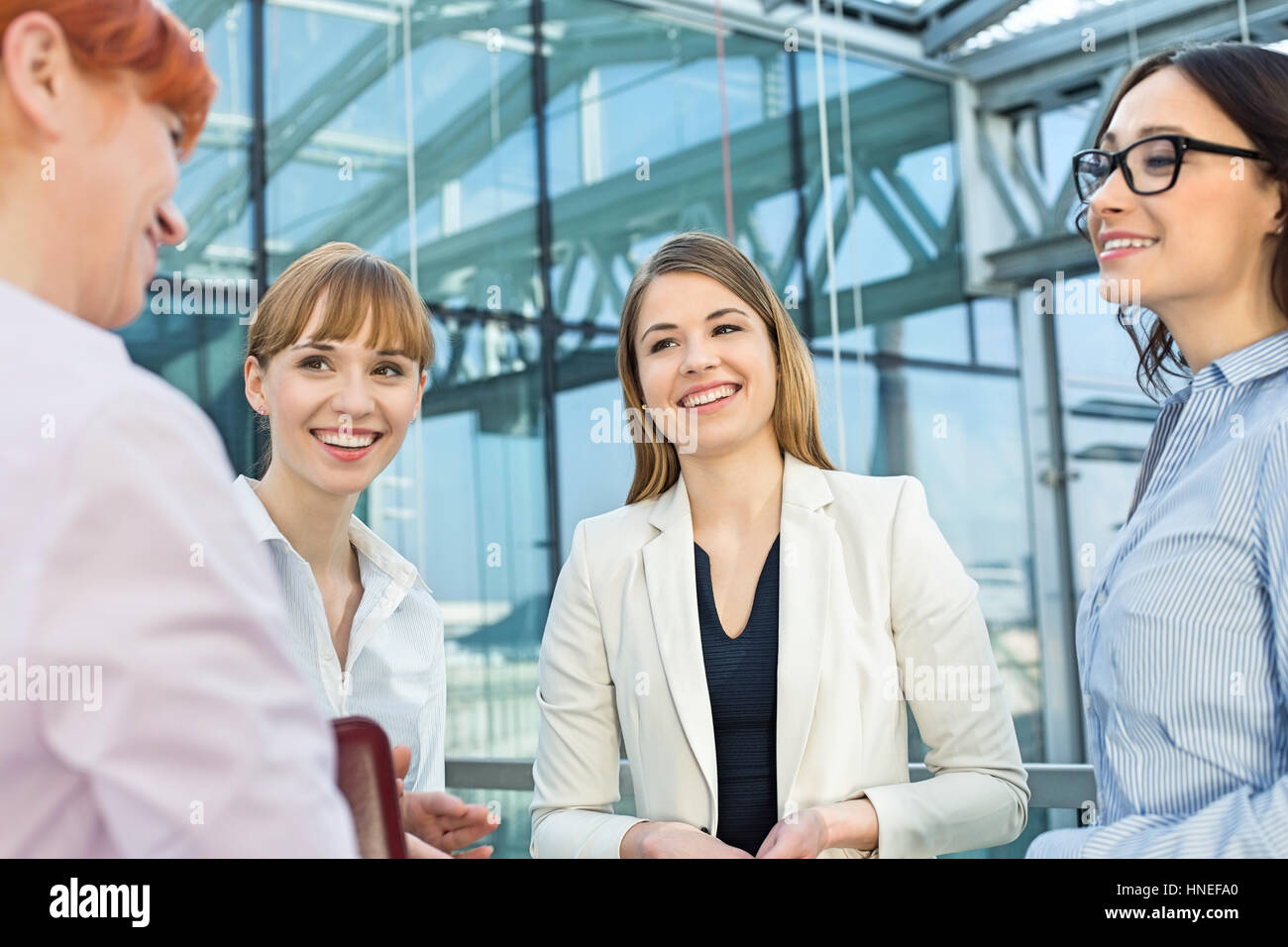 Office happy conversation hi-res stock photography and images - Alamy