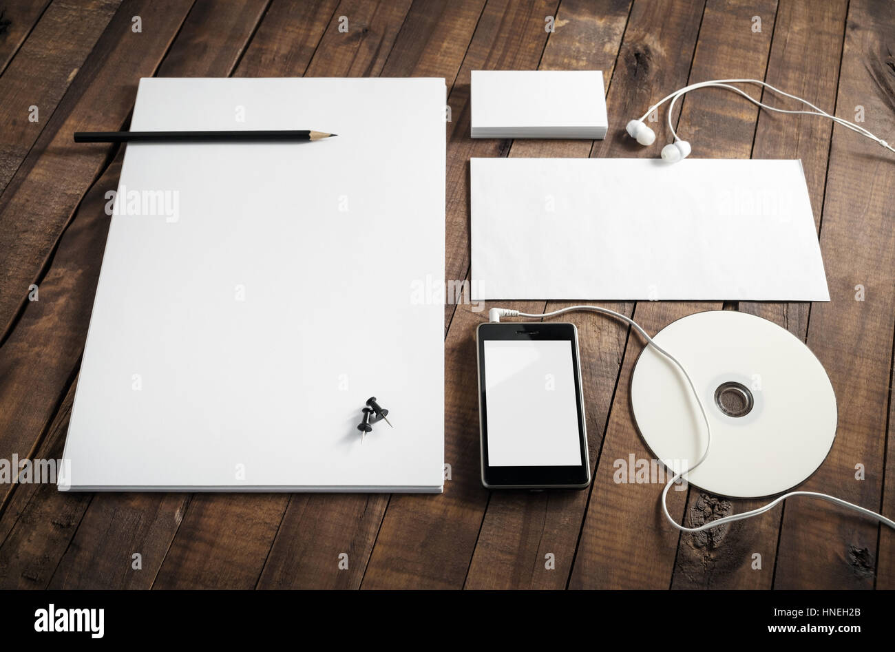 Blank corporate identity template on vintage wooden table background ...