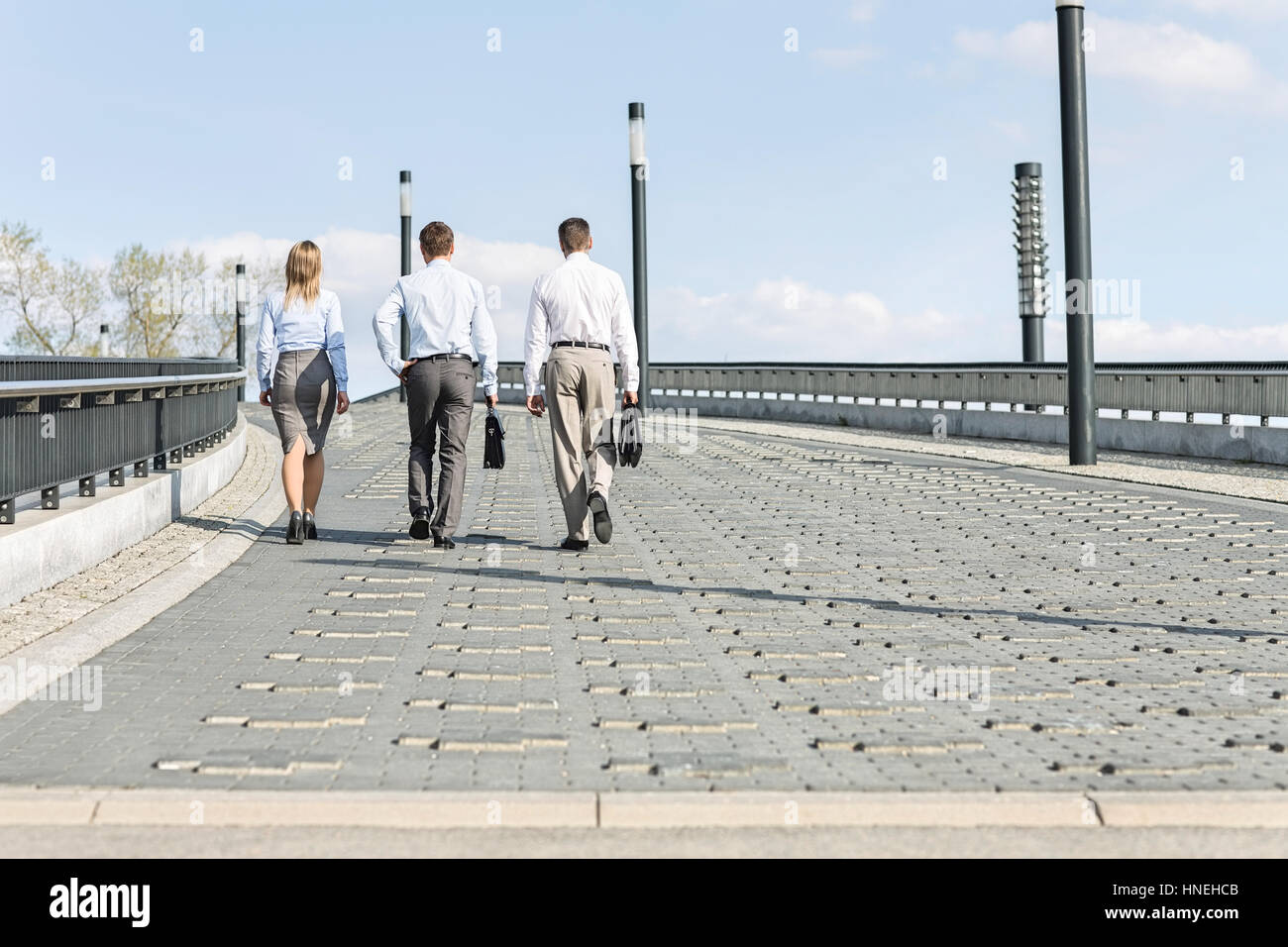 Man walking on bridge side view hi-res stock photography and images - Alamy