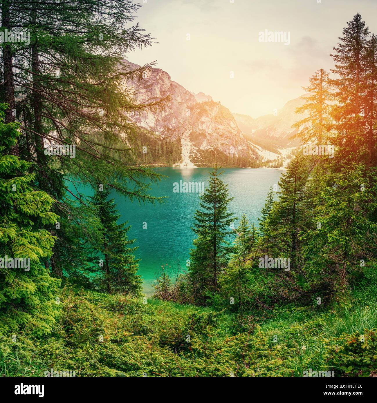 Mountain lake between by mountains Stock Photo - Alamy