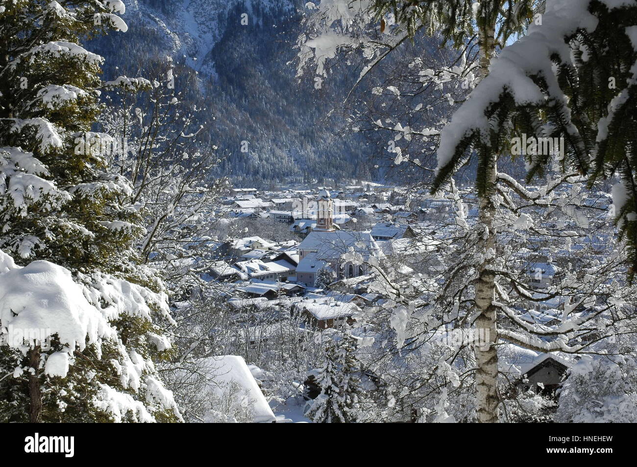 View of scenic winter landscape in the Bavarian Alps with famous St ...
