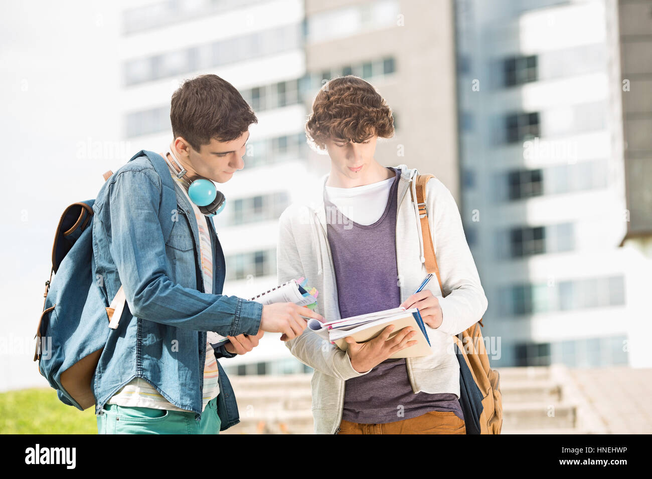 Young male college students studying at campus Stock Photo - Alamy