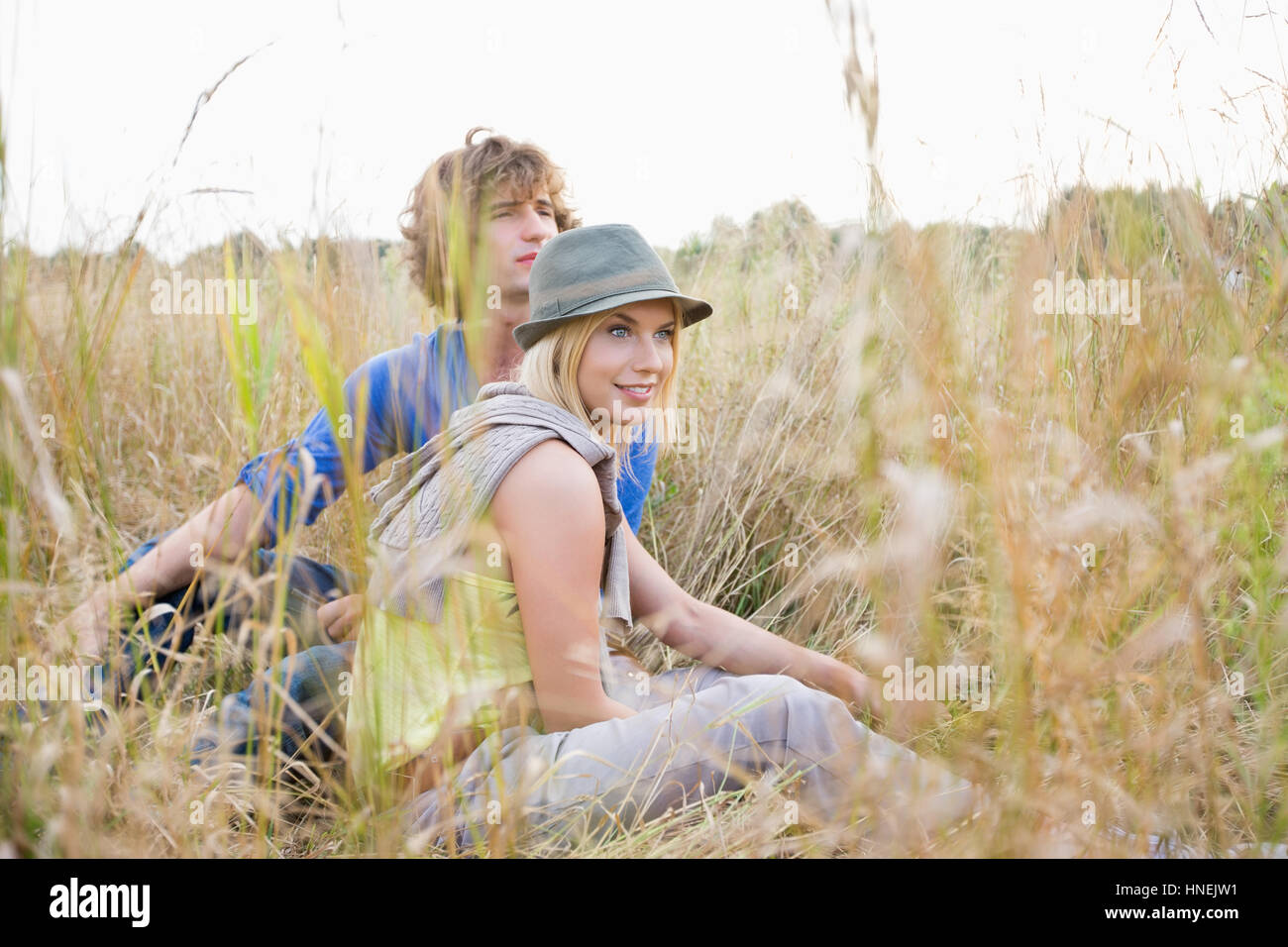 Woman relaxing in field hi-res stock photography and images - Alamy