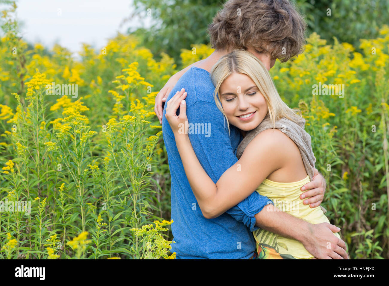 Couple hugging in hi-res stock photography and images - Alamy