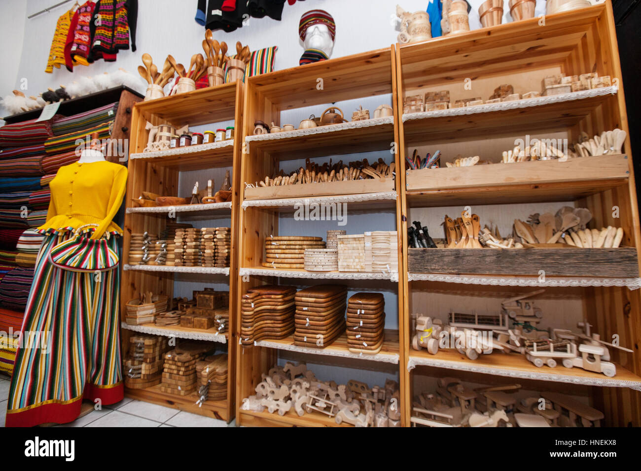 Wooden handicrafts displayed on shelves in gift store Stock Photo - Alamy