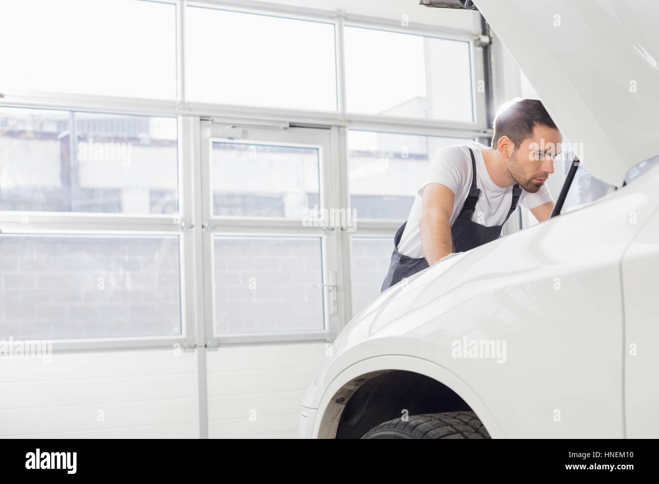 Car repairing engineer hi-res stock photography and images - Alamy