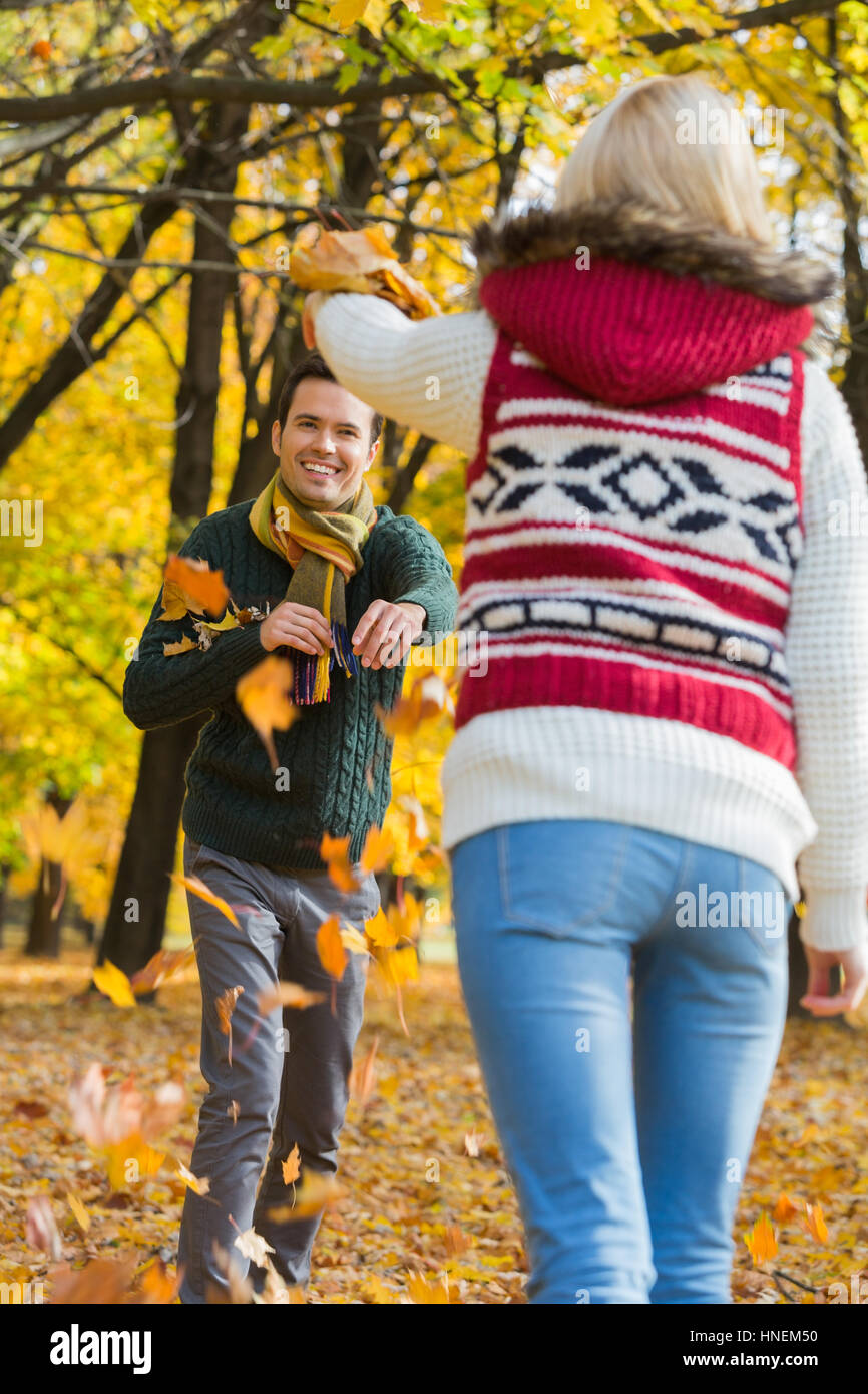 Couple playing in autumn leaves hi-res stock photography and images - Alamy