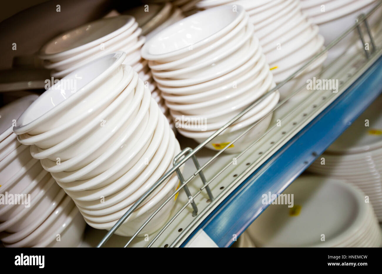 Kitchenware on shelf in supermarket Stock Photo - Alamy