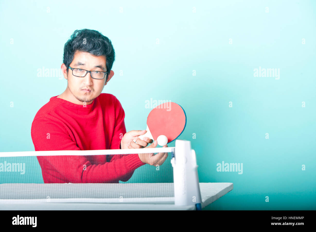 Asian man playing table tennis 20s adult hi-res stock photography and ...