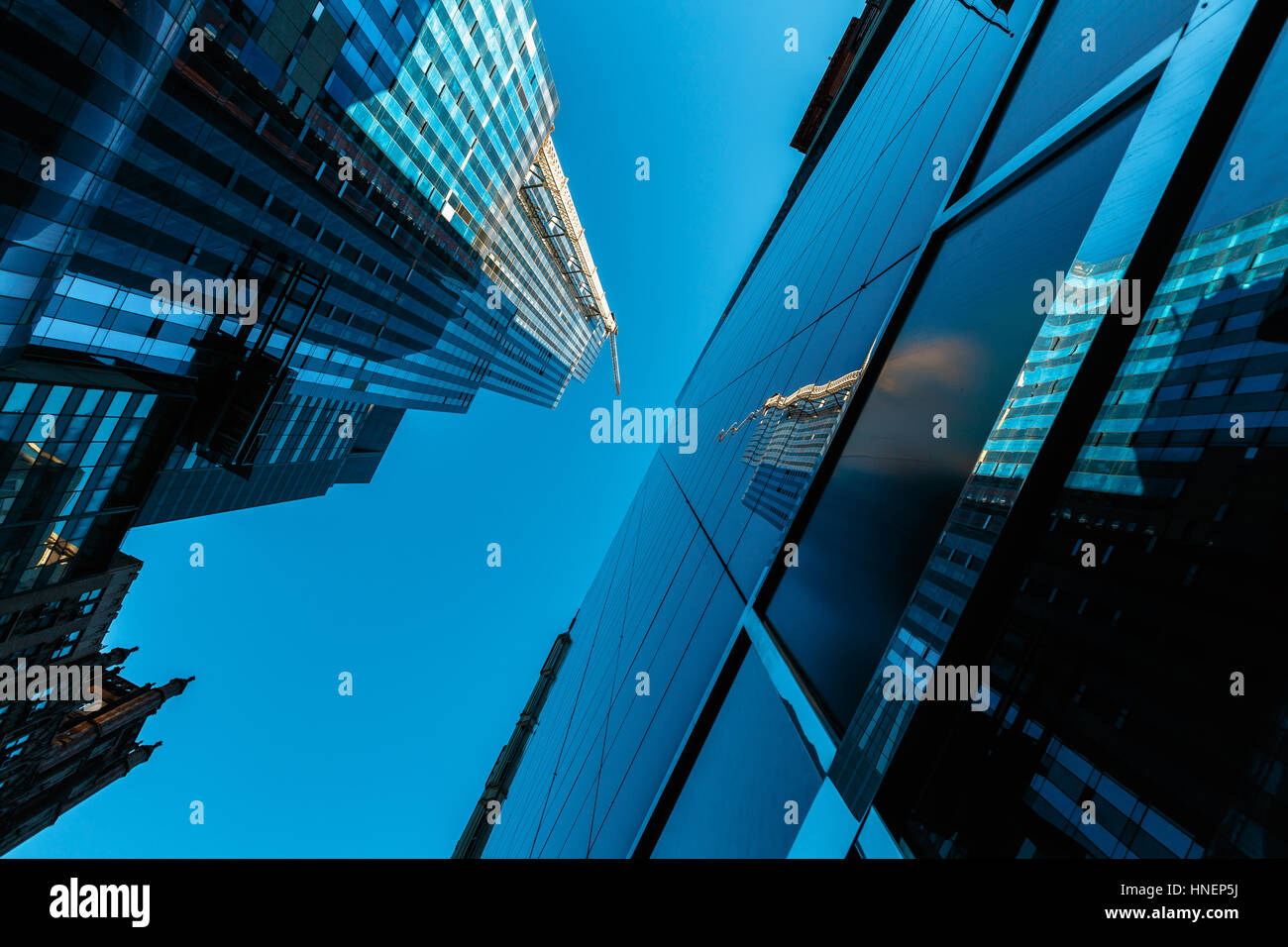 skyscraper reflection blue sky no clouds Stock Photo - Alamy