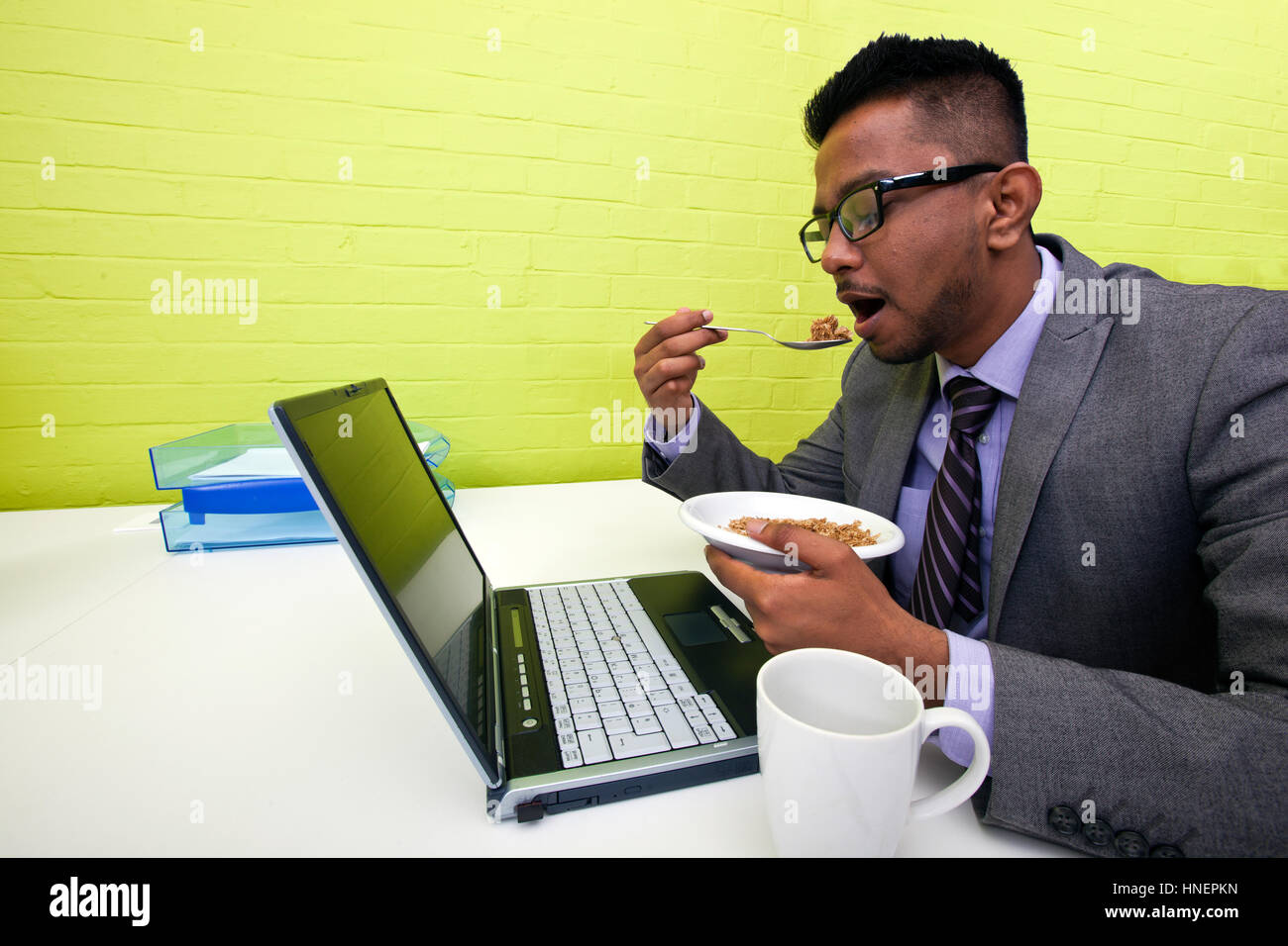 Indian man eating hi-res stock photography and images - Alamy