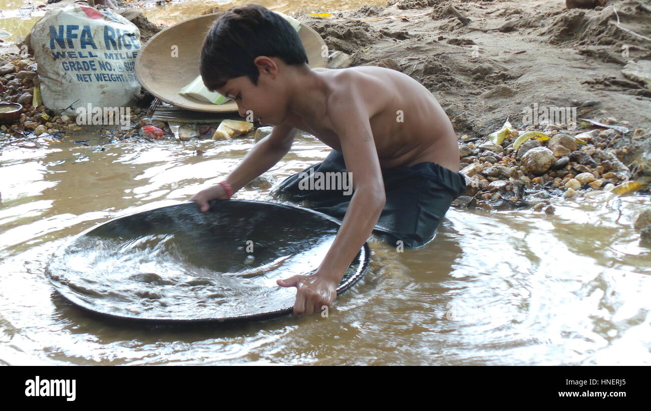 Philippines. 11th Feb, 2017. Bernard, 11 years old, does the ...