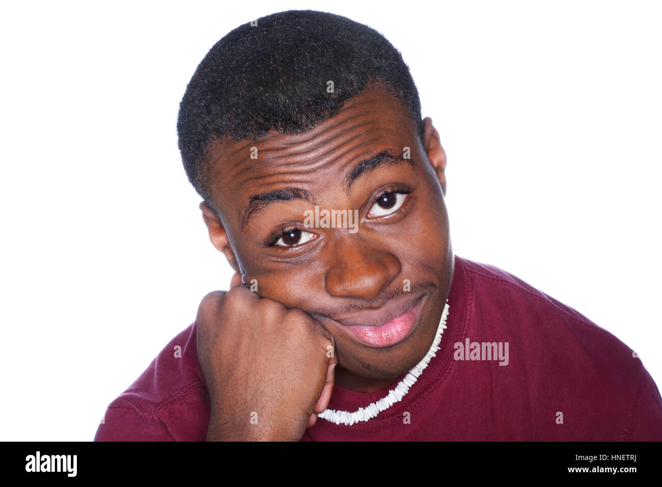 Teen boy with a furrowed brow Stock Photo - Alamy
