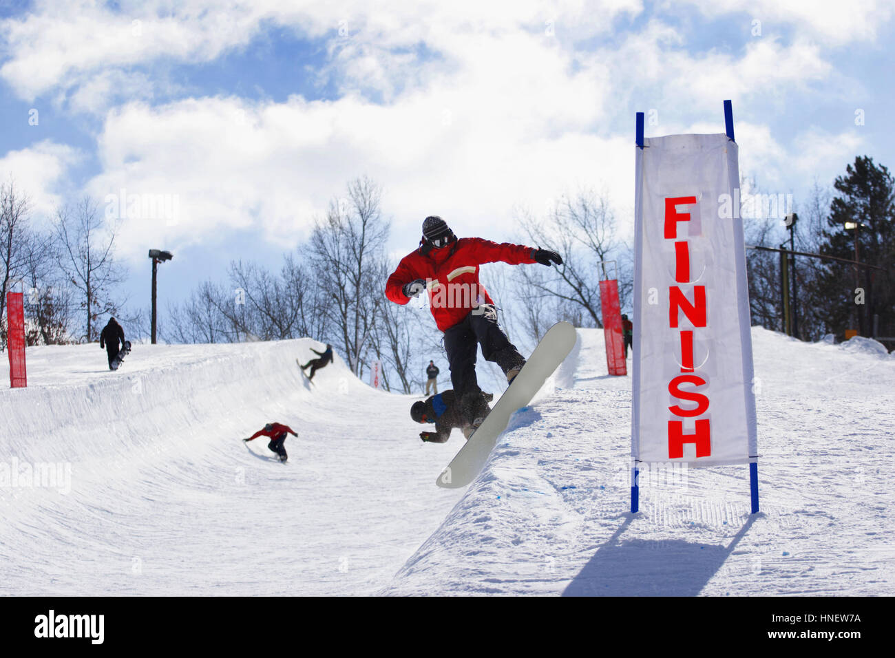 Snowboarders in a half pipe Stock Photo - Alamy