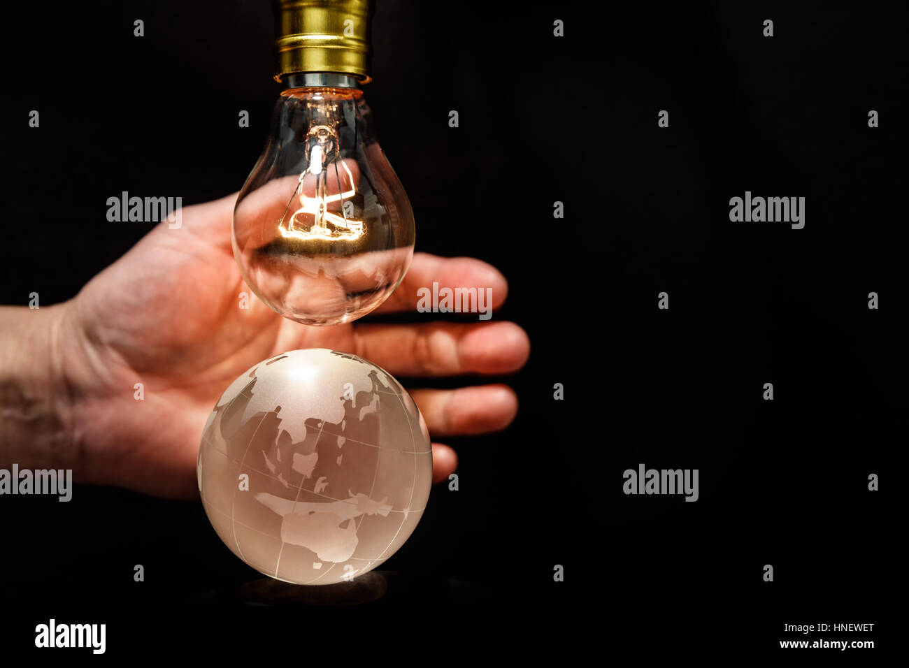 Light bulb and earth, concept of global issues Stock Photo - Alamy