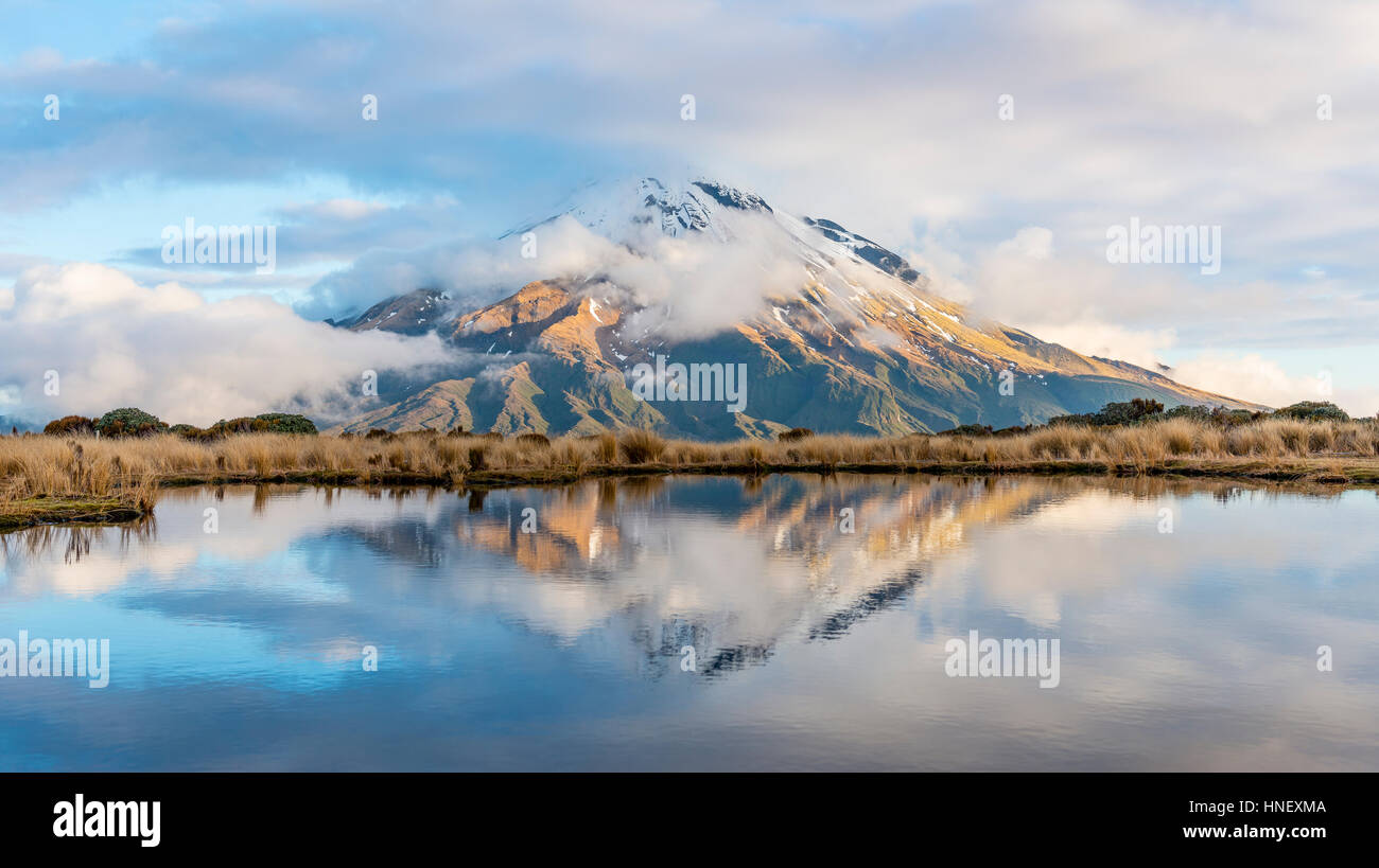 Reflection in Pouakai Tarn, stratovolcano Mount Taranaki or Mount ...