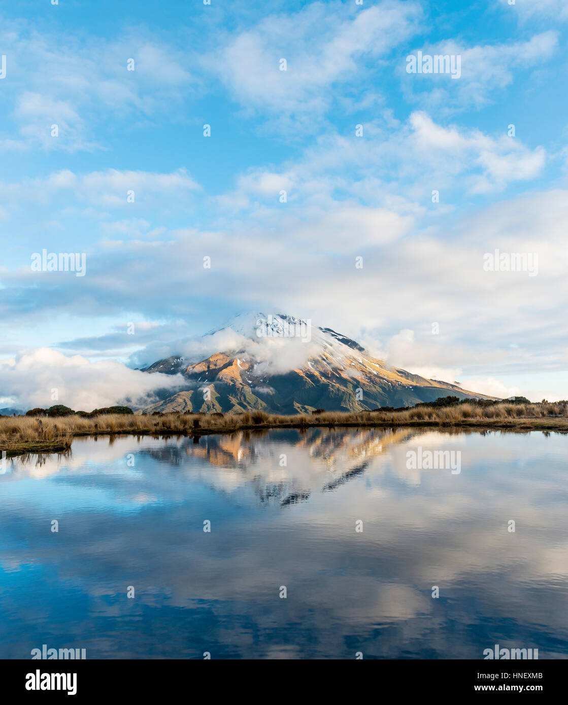 Reflection in Pouakai Tarn, stratovolcano Mount Taranaki or Mount ...