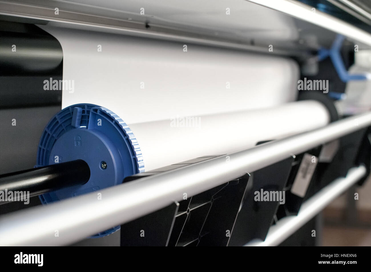 Close-up view of paper roll mechanism of professional wide format ...