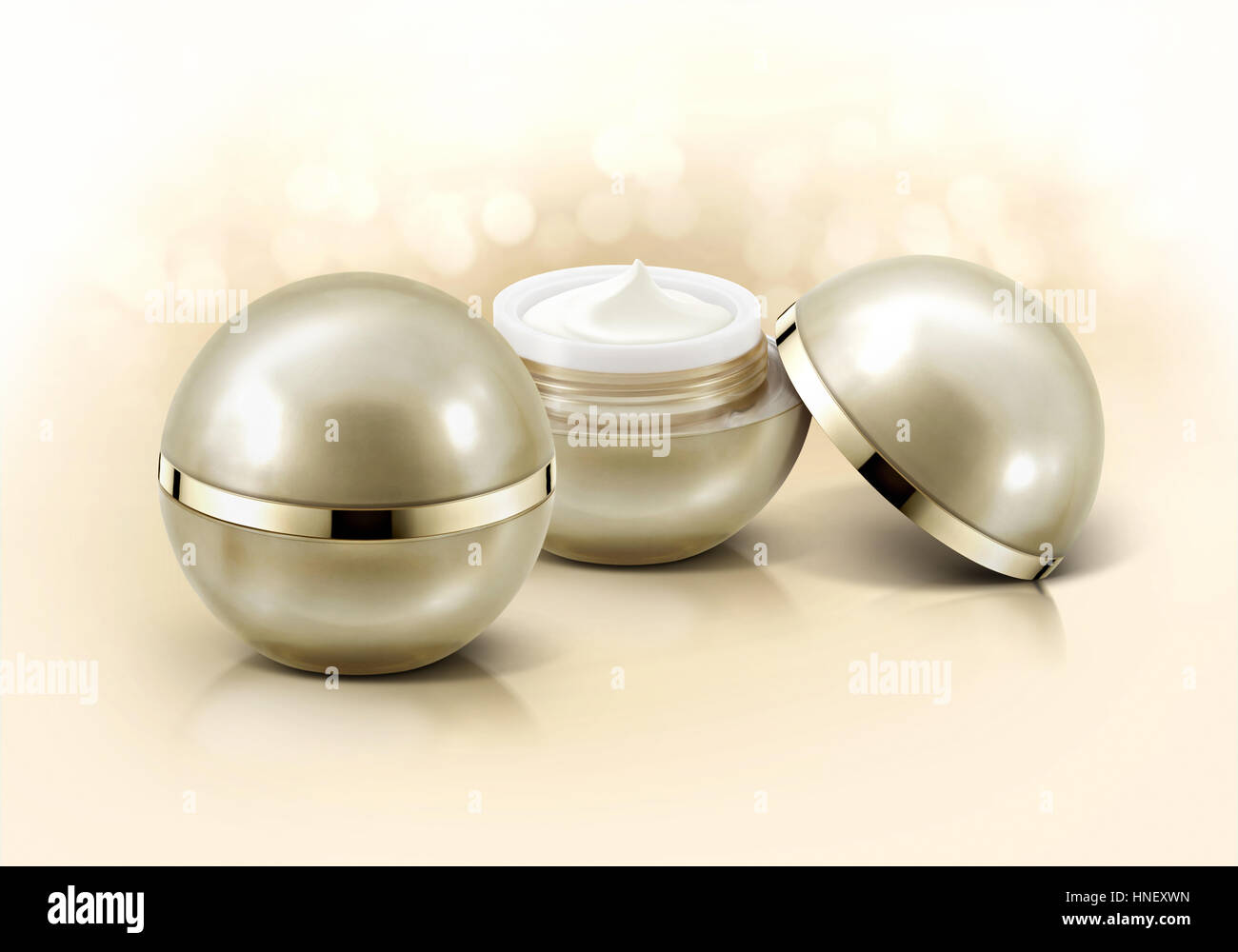Golden sphere cosmetic jar on glitter background Stock Photo - Alamy