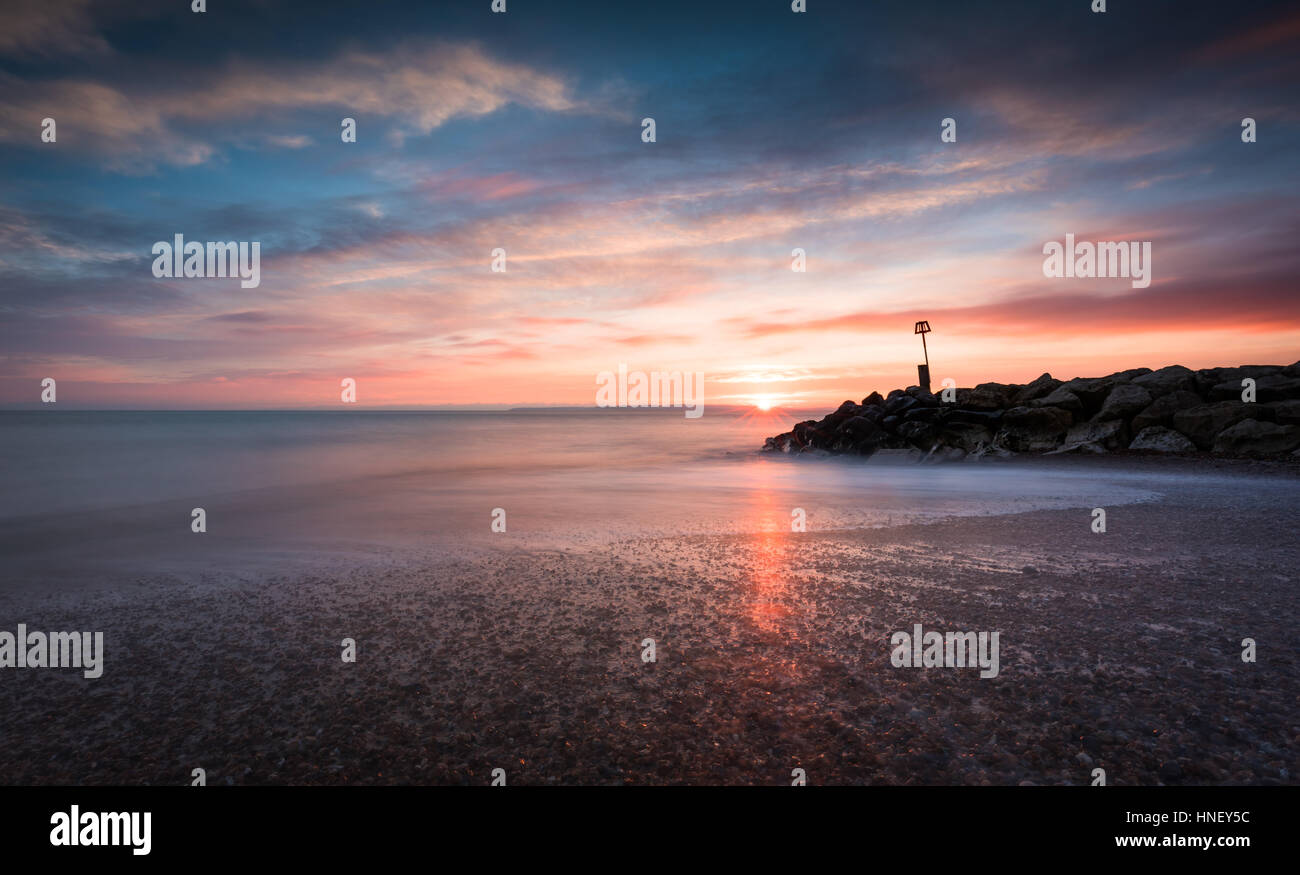 Sunset on Southbourne Beach in Dorset Stock Photo - Alamy