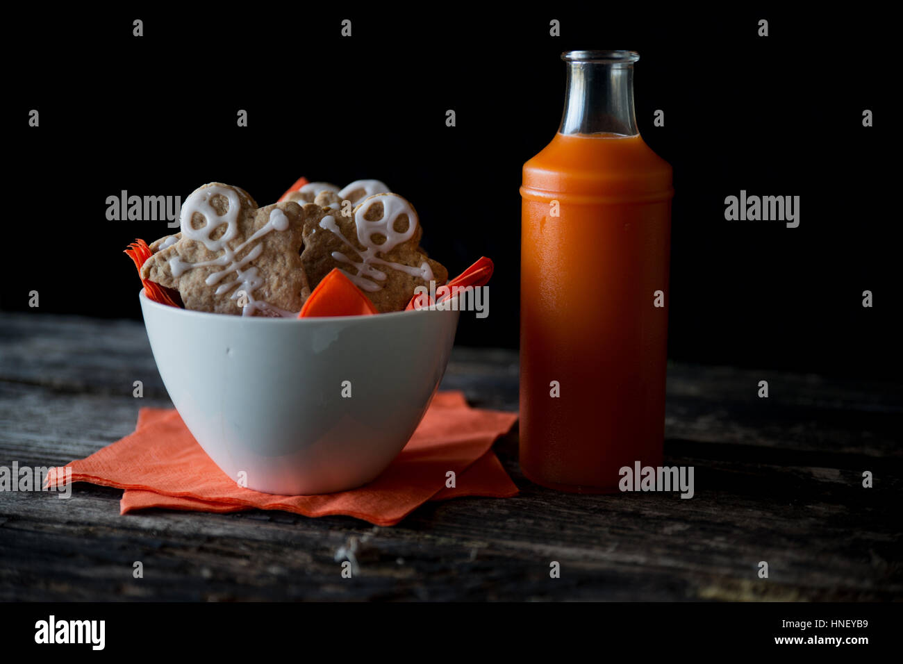 Cookies with skeleton made of icing in bowl, Halloween Stock Photo - Alamy