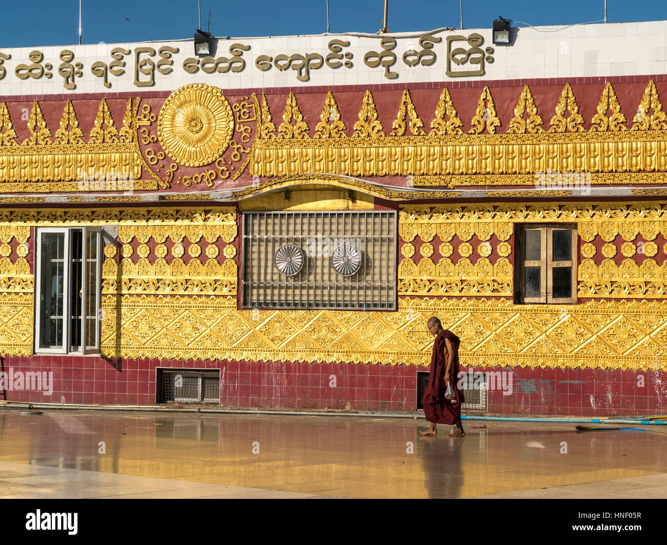 Monk inside temple complex at Golden Rock Kyaiktiyo, Kyaikto, Myanmar ...