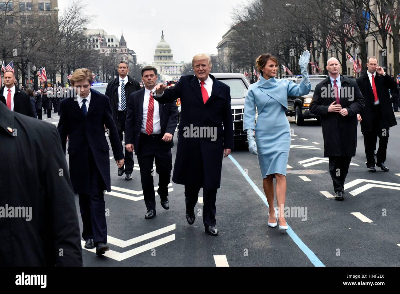 U.S. President Donald Trump, First Lady Melania Trump, and son Barron Trump walk down ...
