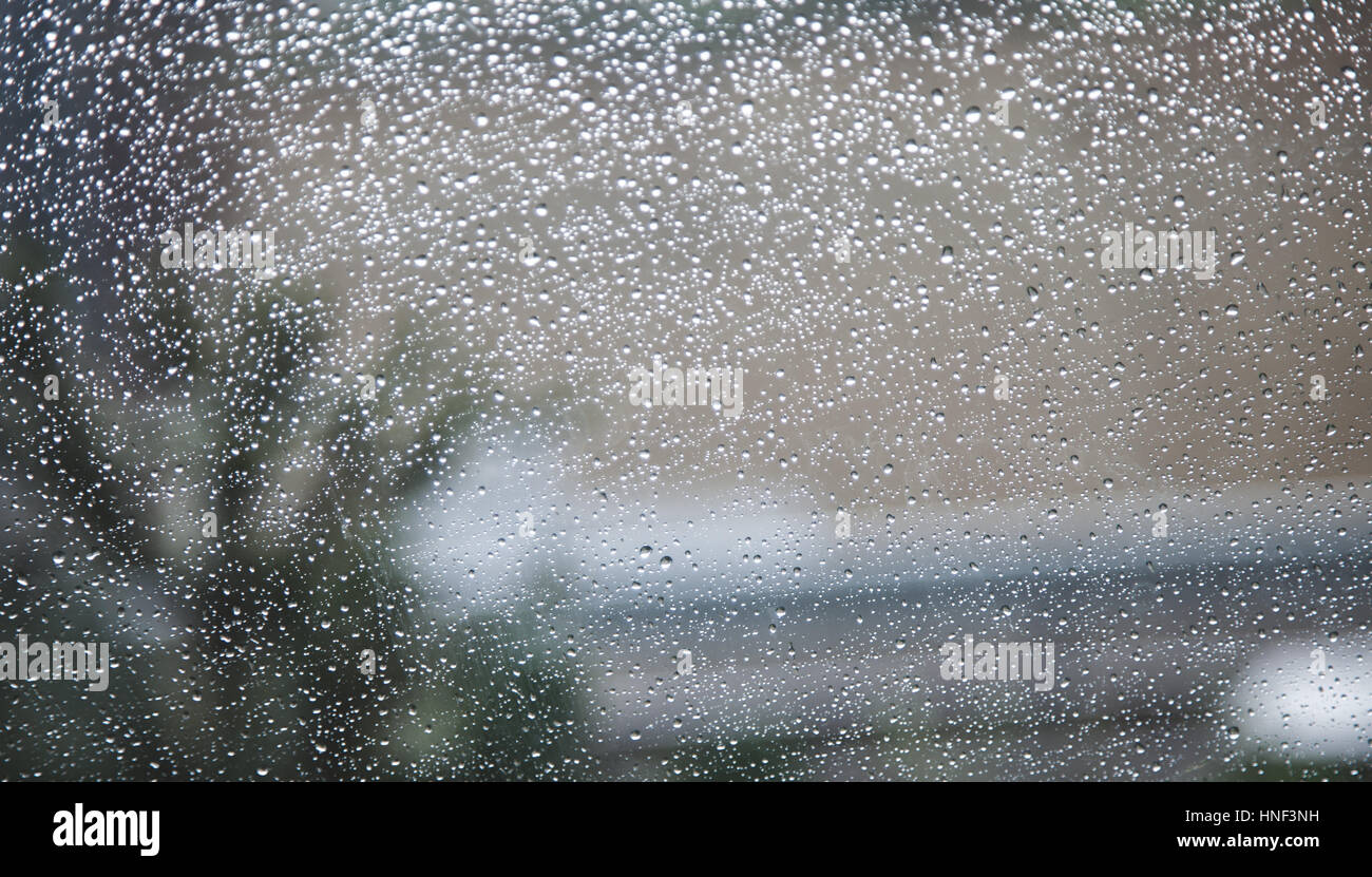 Detail Â· Close up photo of street through window full of rain Stock ...