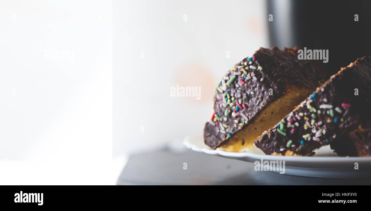 Two slices of homemade cake with daylight Stock Photo - Alamy