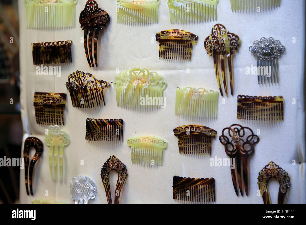 Traditional Spanish hair combs in shop window, city of Valencia, Spain ...