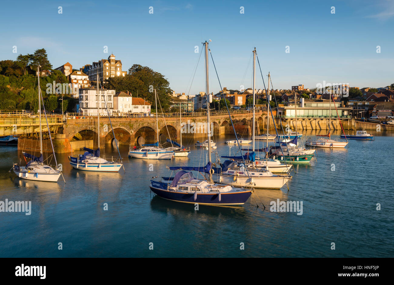 Fishing boats in Folkestone Harbour, Kent with the Folkestone Harbour ...