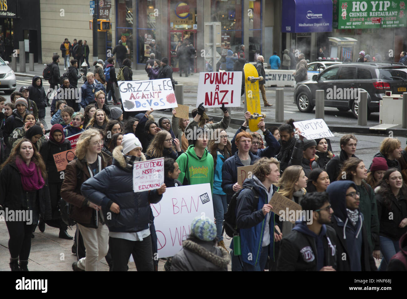 College students walk out to demonstrate and march against Trump ...