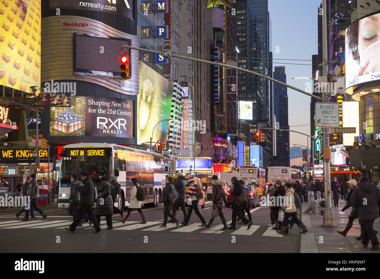 People walk across 42nd Street in Times Square, New York City Stock ...
