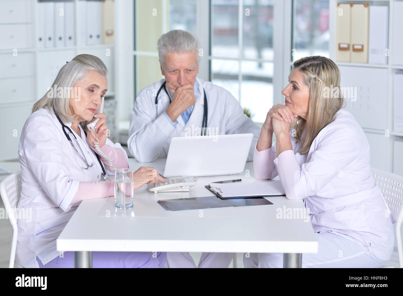 doctors discussing something Stock Photo - Alamy