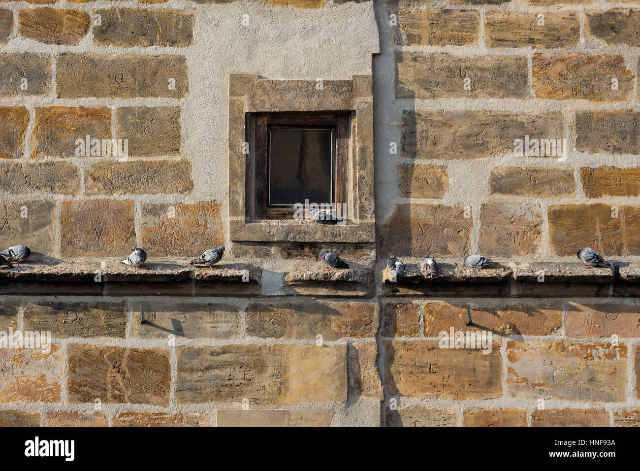 Old and grunge stone wall and window, medieval gothic architecture ...