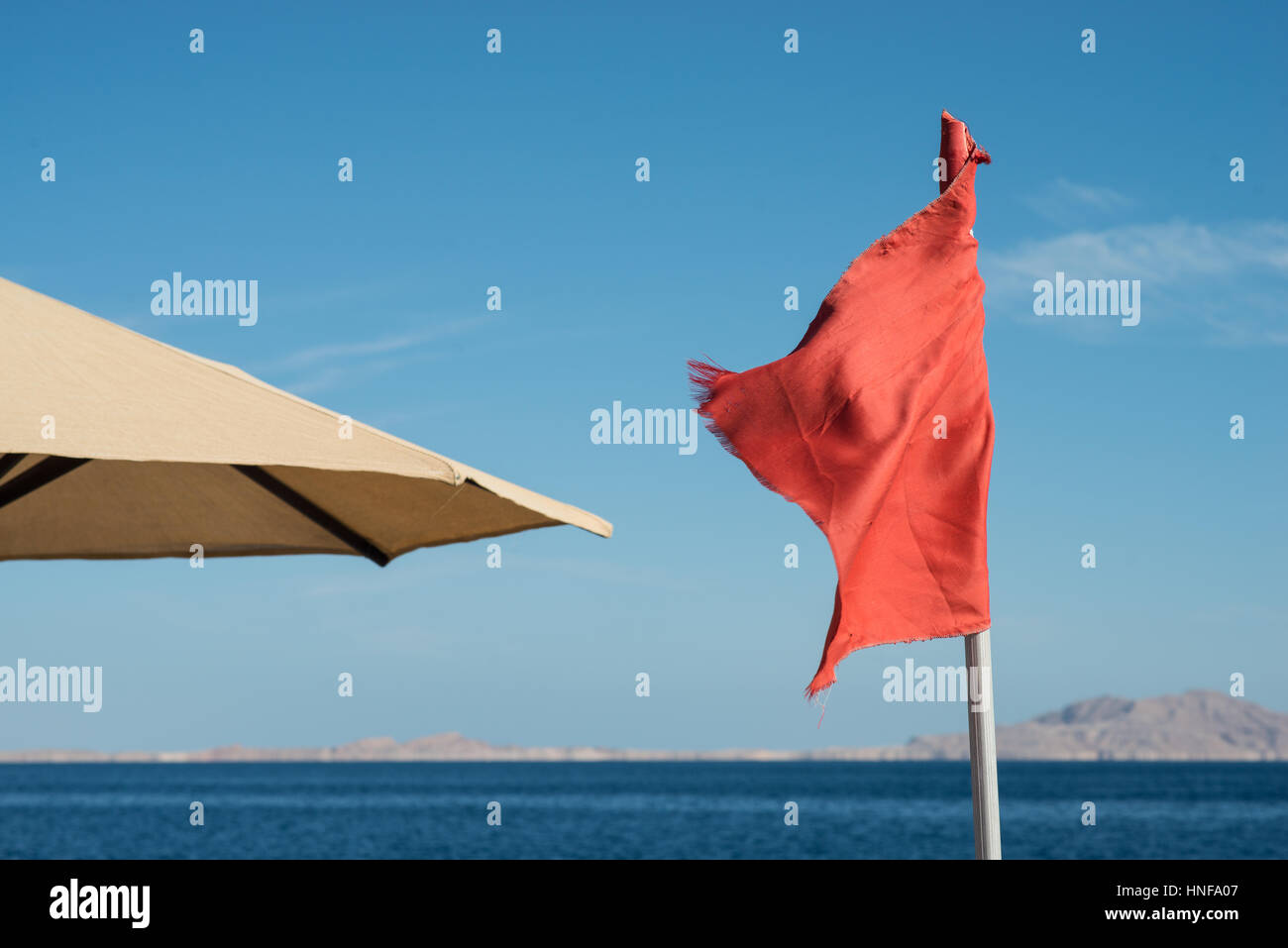 red flag at sea. Swimming is prohibited Stock Photo - Alamy