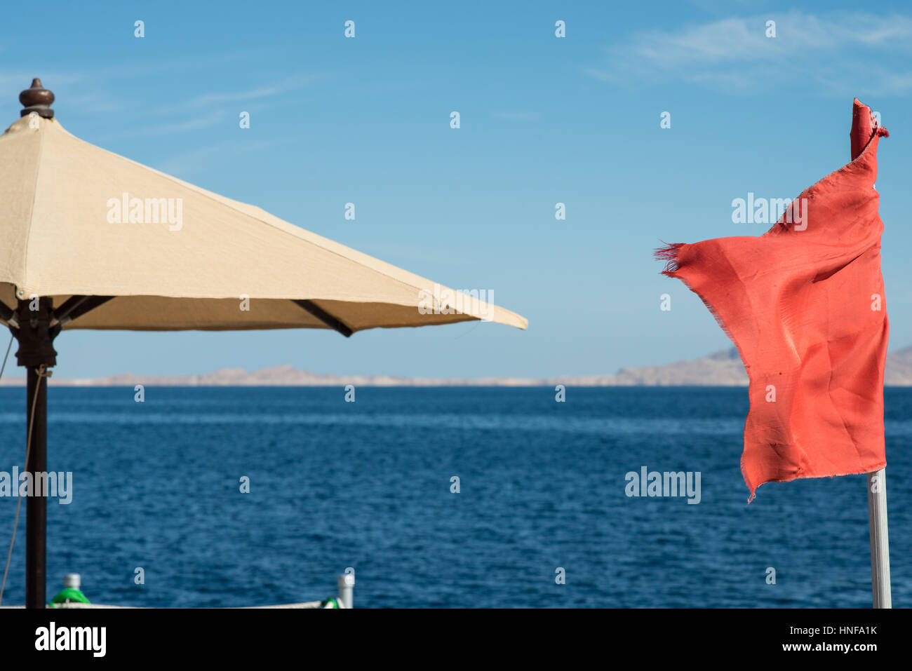 red flag at sea. Swimming is prohibited Stock Photo - Alamy