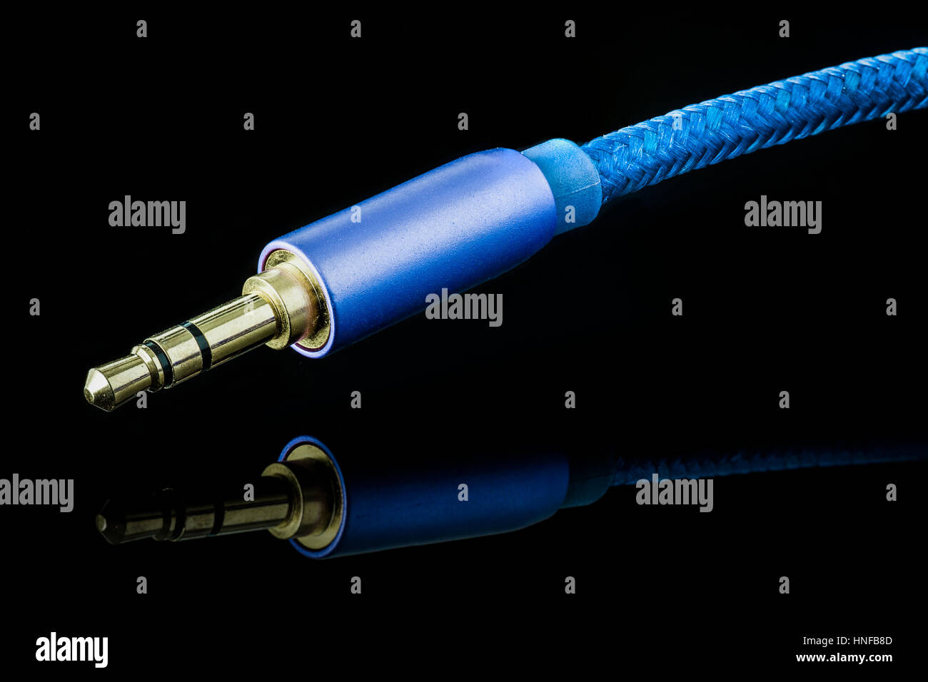 Stereo mini jack plug with blue braid Stock Photo - Alamy