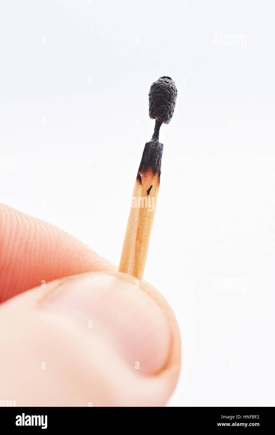One burn match in hand close up isolated on white background Stock ...