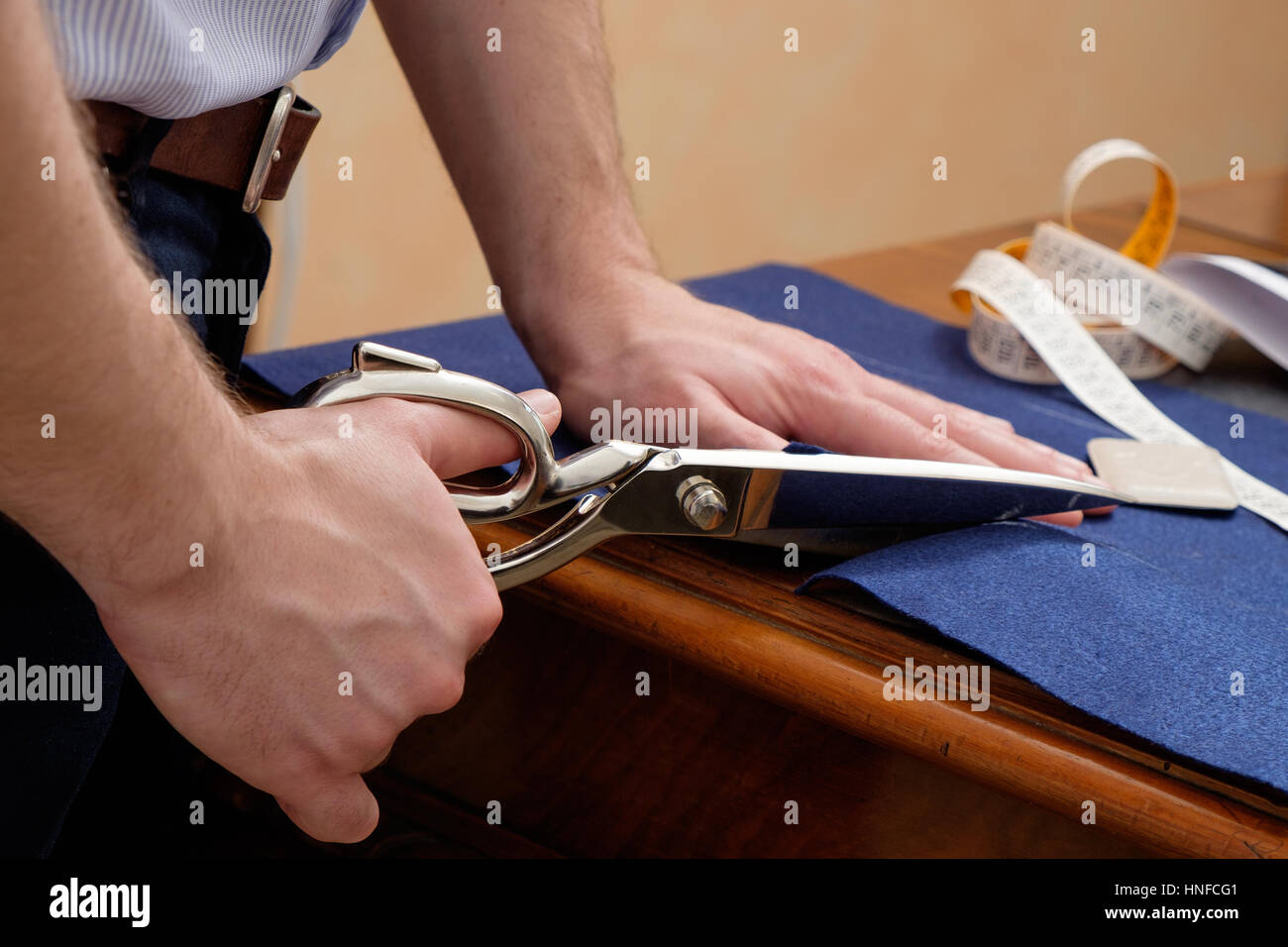 Tailor made tailor hi-res stock photography and images - Alamy